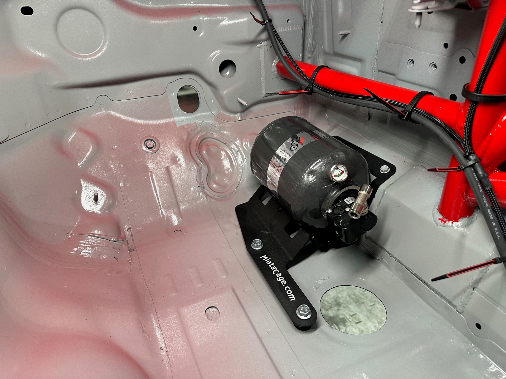 Miatacage.com. Fire Bottle Mount - NC Miata